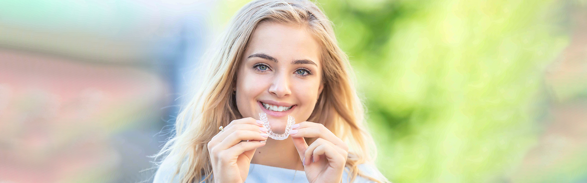 How does Invisalign move teeth?